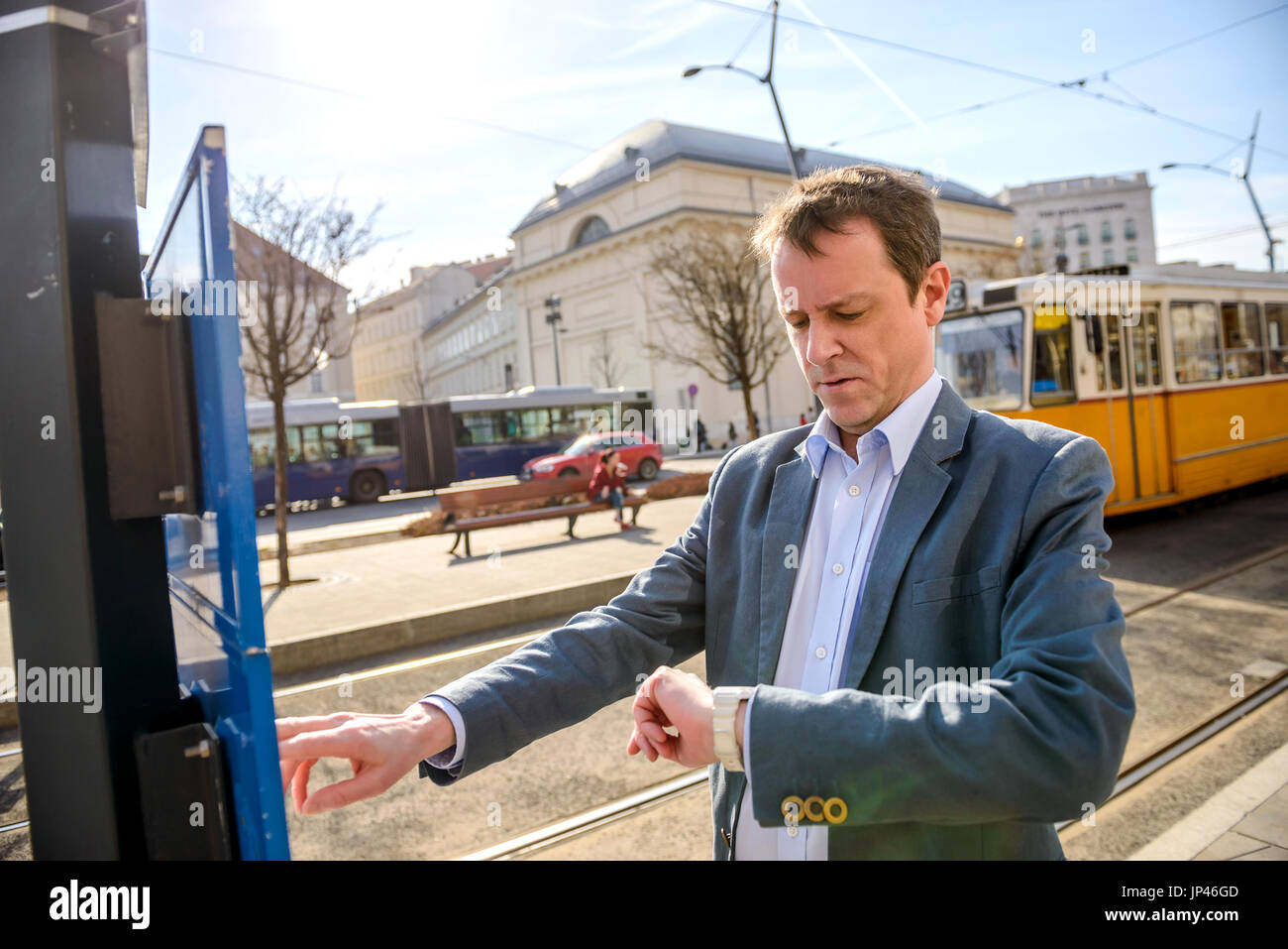People watching timetable hi-res stock photography and images - Alamy