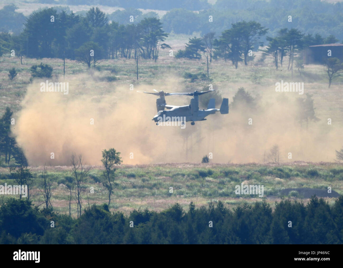 YAMANASHI, Japan - A MV-22 Osprey aircraft conducts landing and takeoff ...