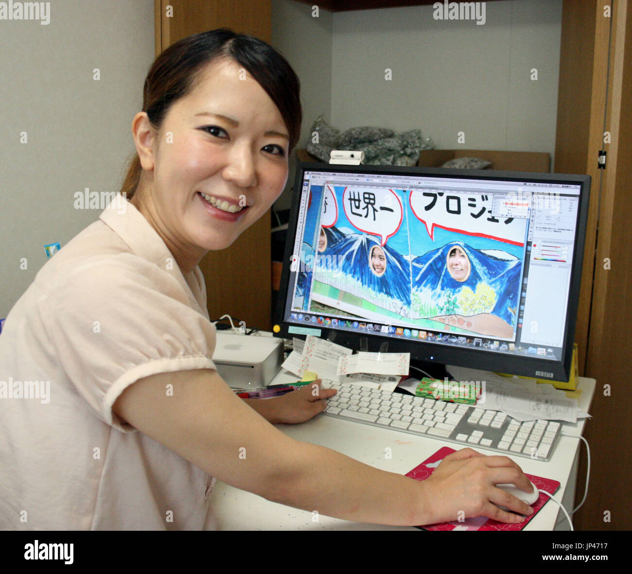 KUSHIRO, Japan - Ayako Maura, a graphic designer and leader of a civic ...