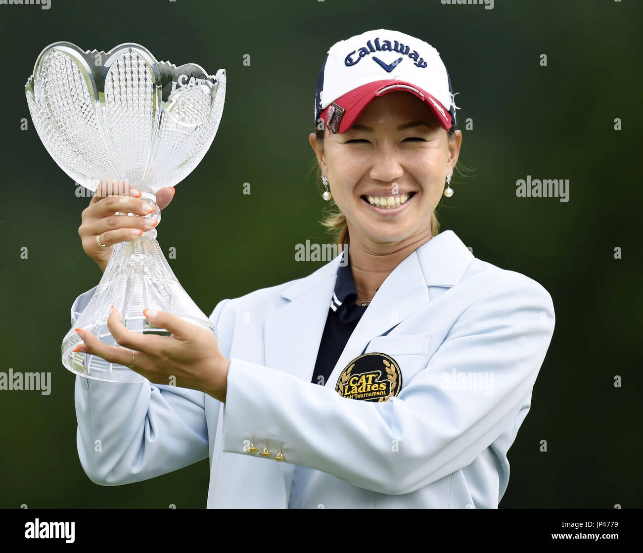 HAKONE, Japan - Japanese professional golfer Momoko Ueda gives a big ...