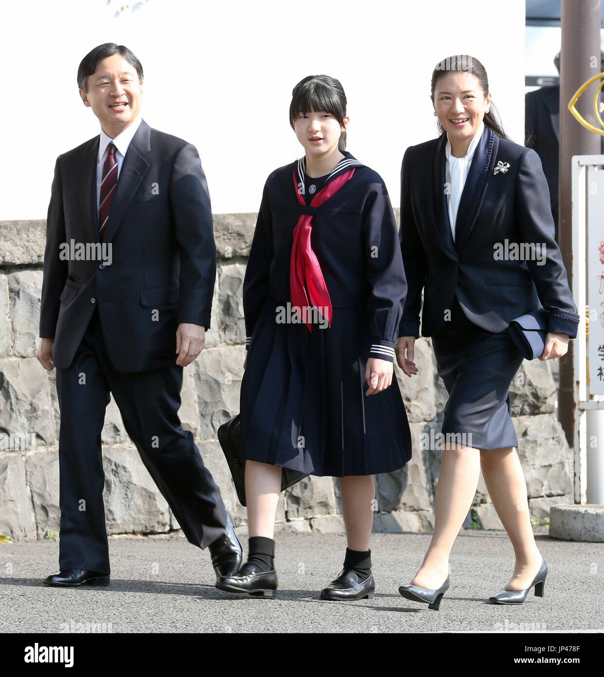 TOKYO, Japan - Princess Aiko (C) heads for her graduation ceremony at ...