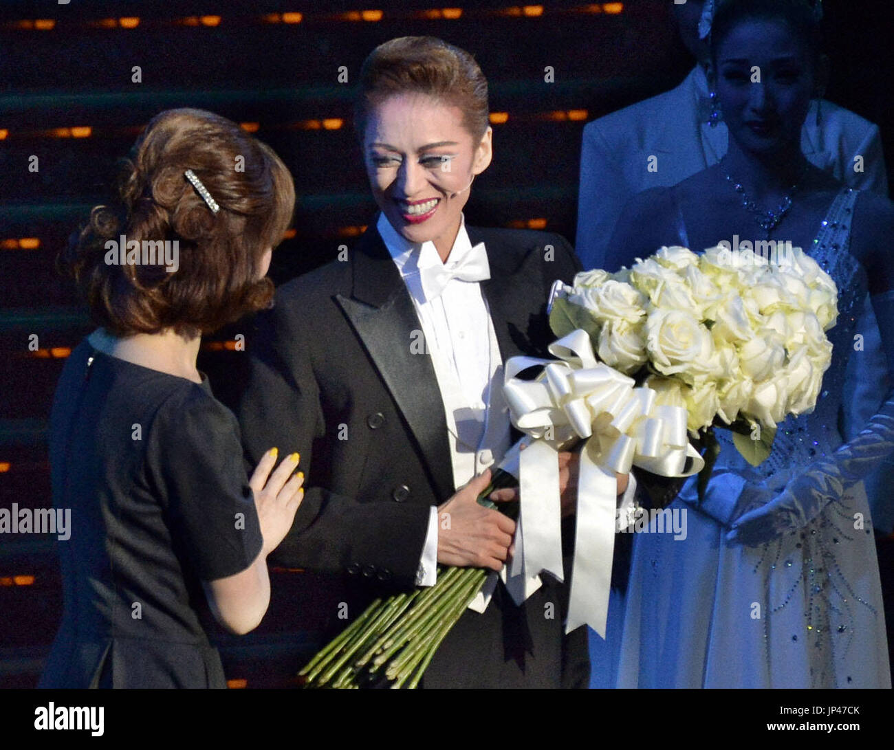 TAKAZAZUKA, Japan - Tomu Ranju (2nd from L), a top star of the all ...