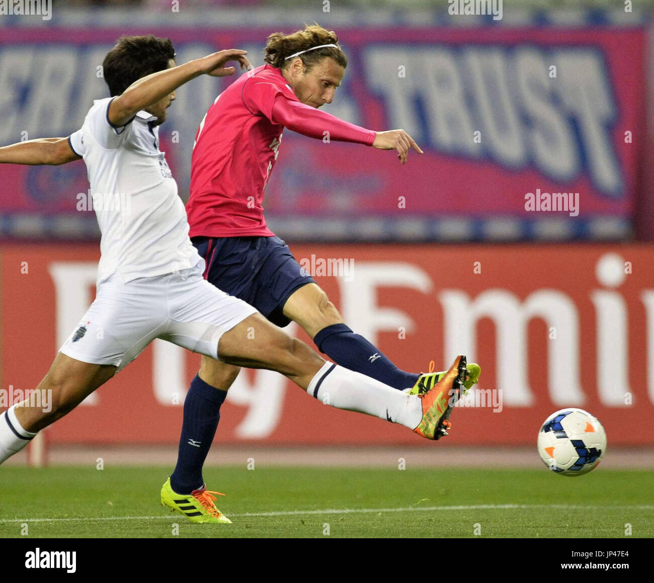 OSAKA, Japan - Diego Forlan (R) of Japanese football club Cerezo Osaka ...