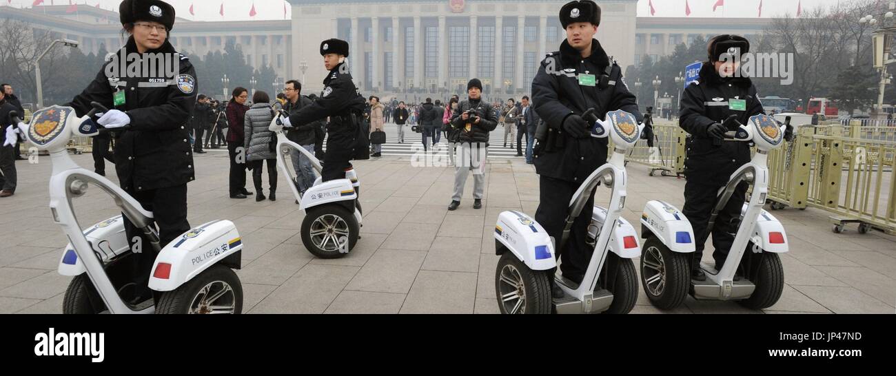 BEIJING, China - Chinese police officers use two-wheeled electric ...