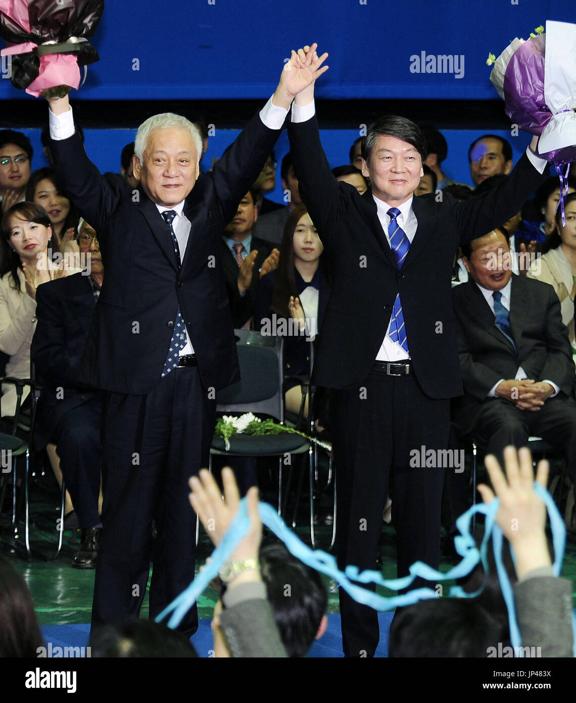 SEOUL, South Korea - Kim Han Gil (L) and Ahn Cheol Soo are chosen as co ...