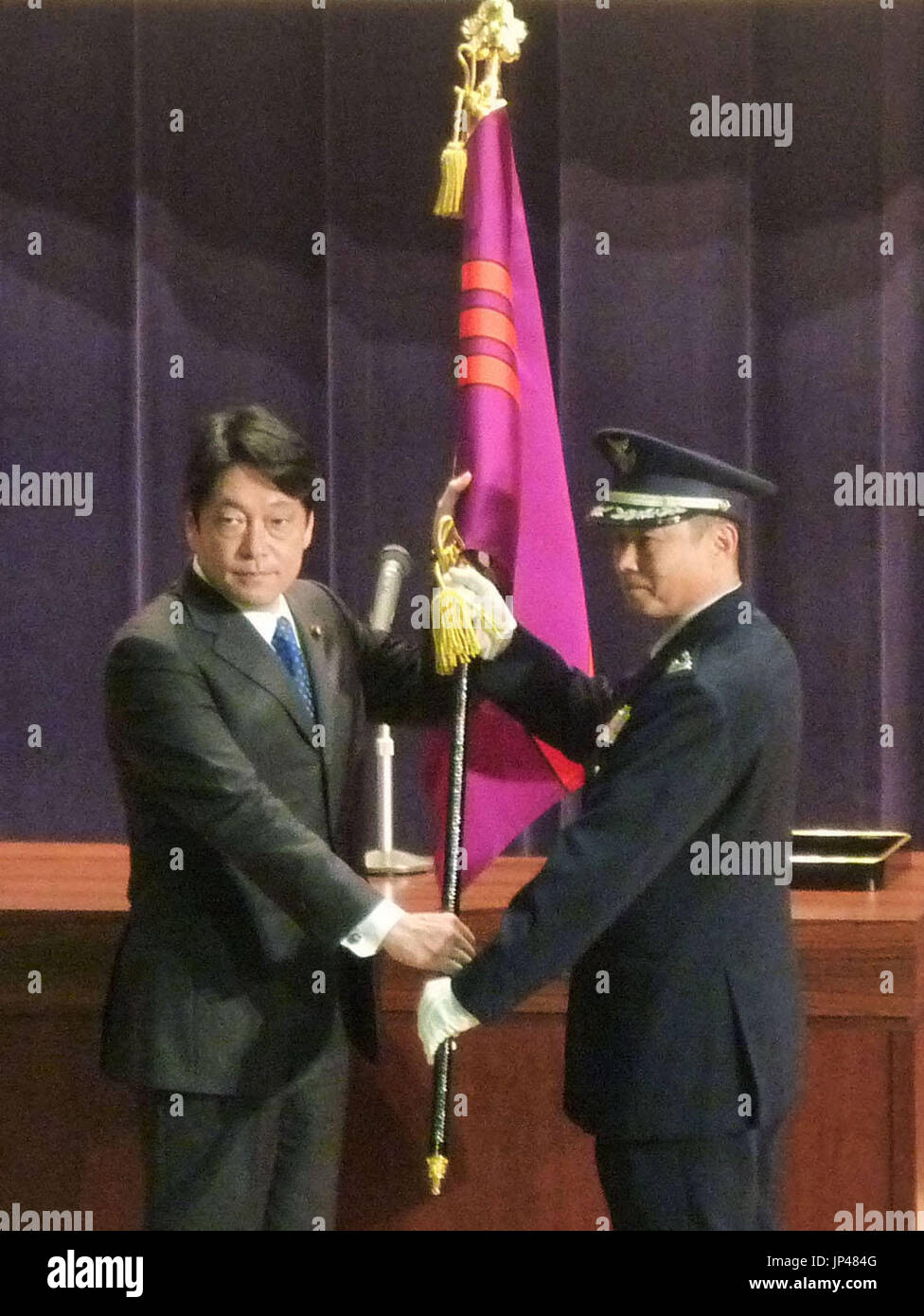 TOKYO, Japan - Japanese Defense Minister Itsunori Onodera (L) hands the ...