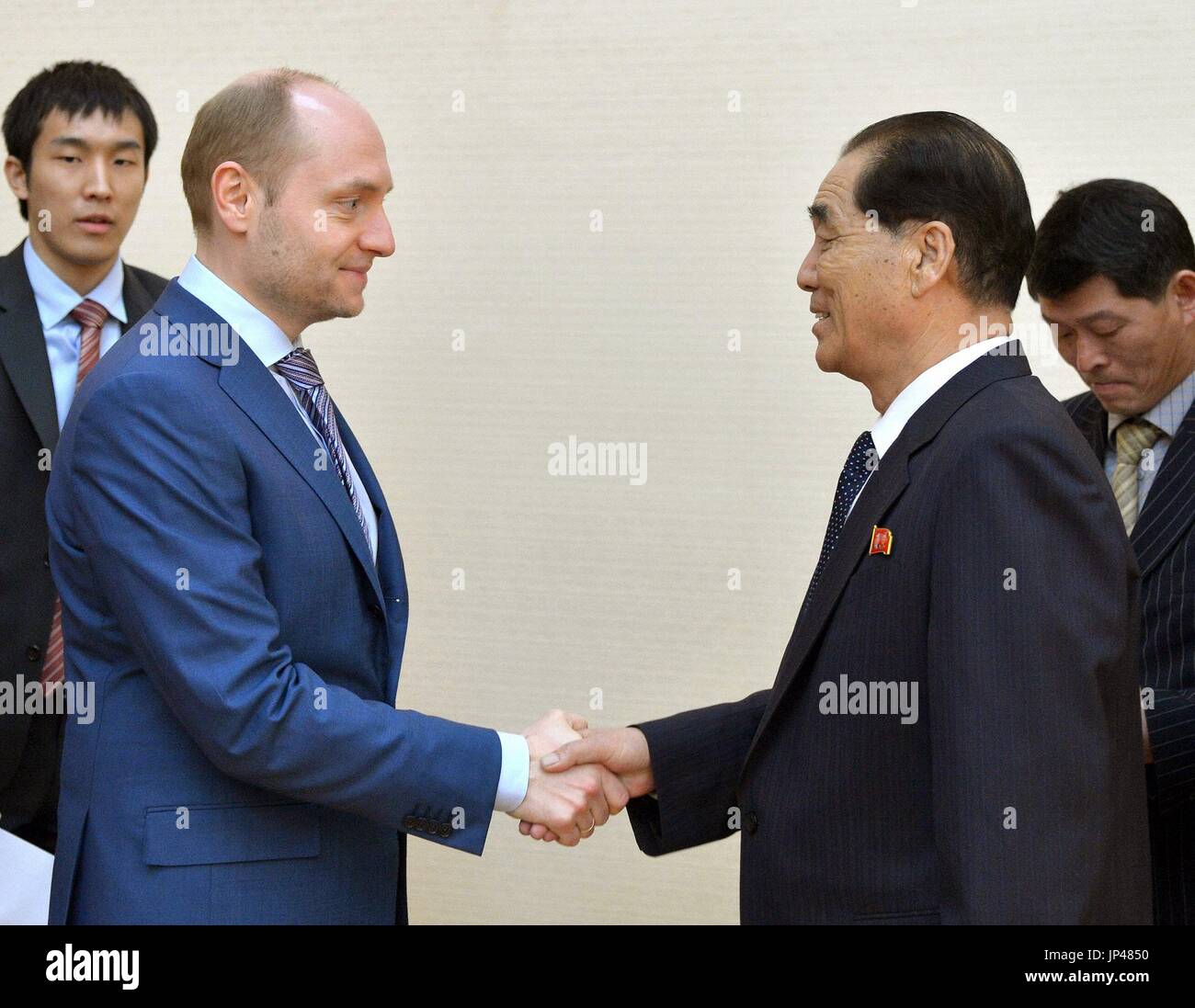 PYONGYANG, North Korea - North Korean Premier Pak Pong Ju (R) shakes ...