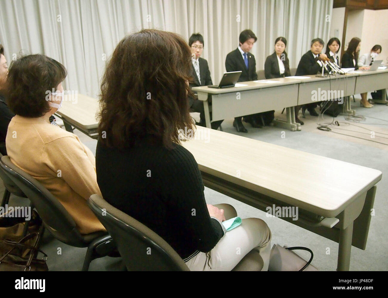 SHIZUOKA, Japan - Plaintiffs (front, back to camera), and their lawyers ...