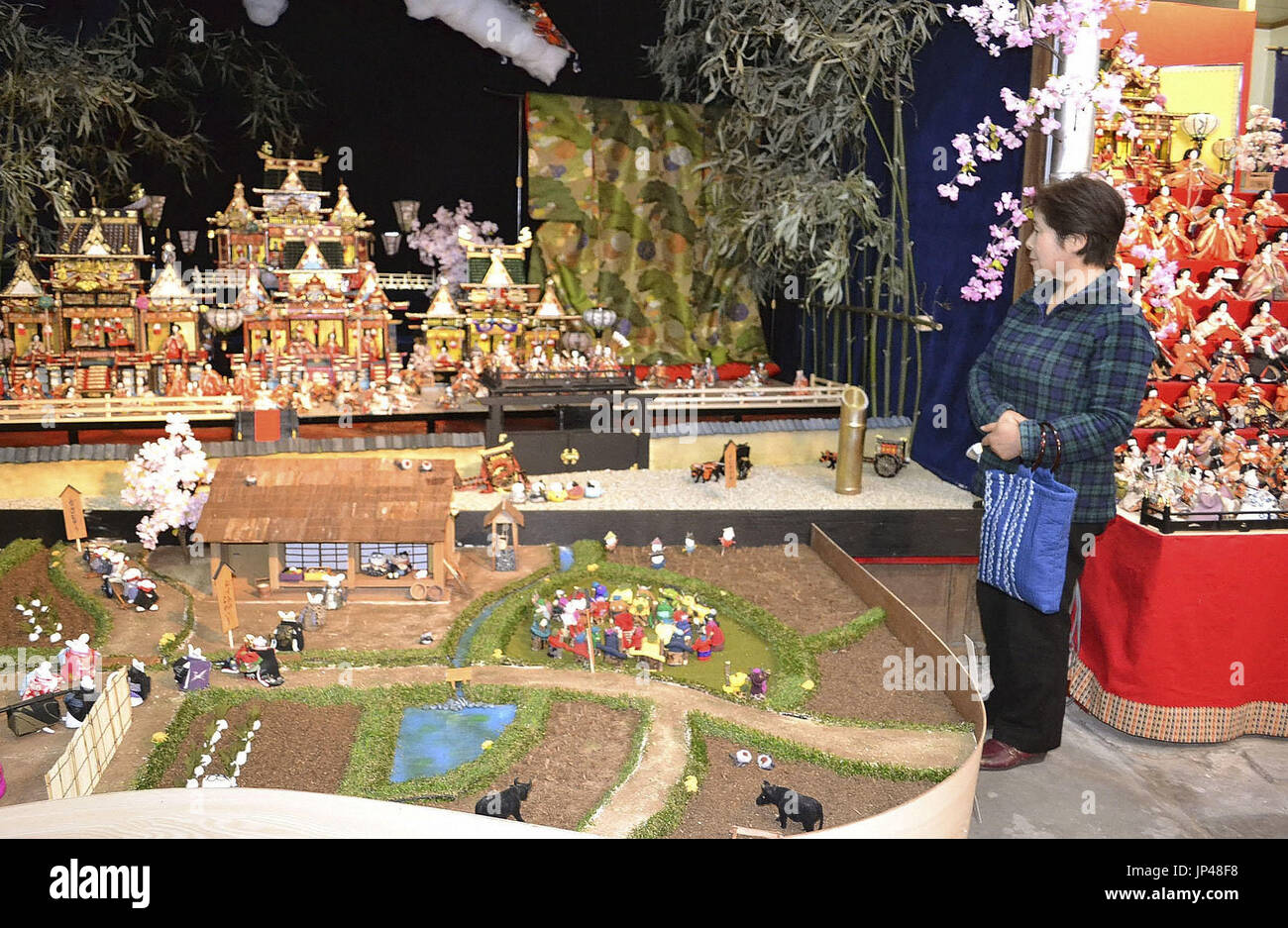 HASHIMOTO, Japan - A visitor views a display of dolls themed after ...