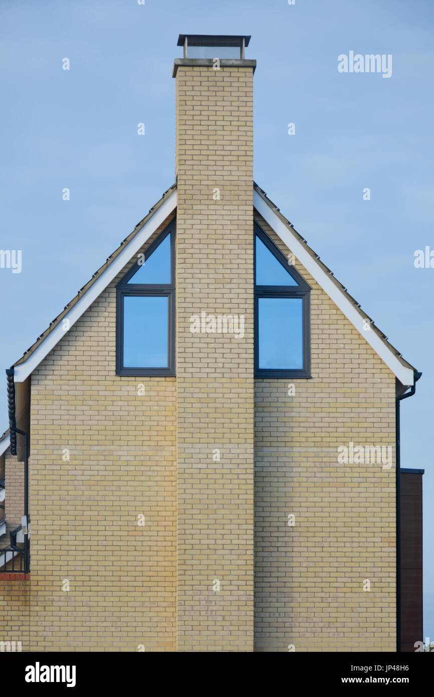 Side of Modern House with Chimney Stock Photo - Alamy