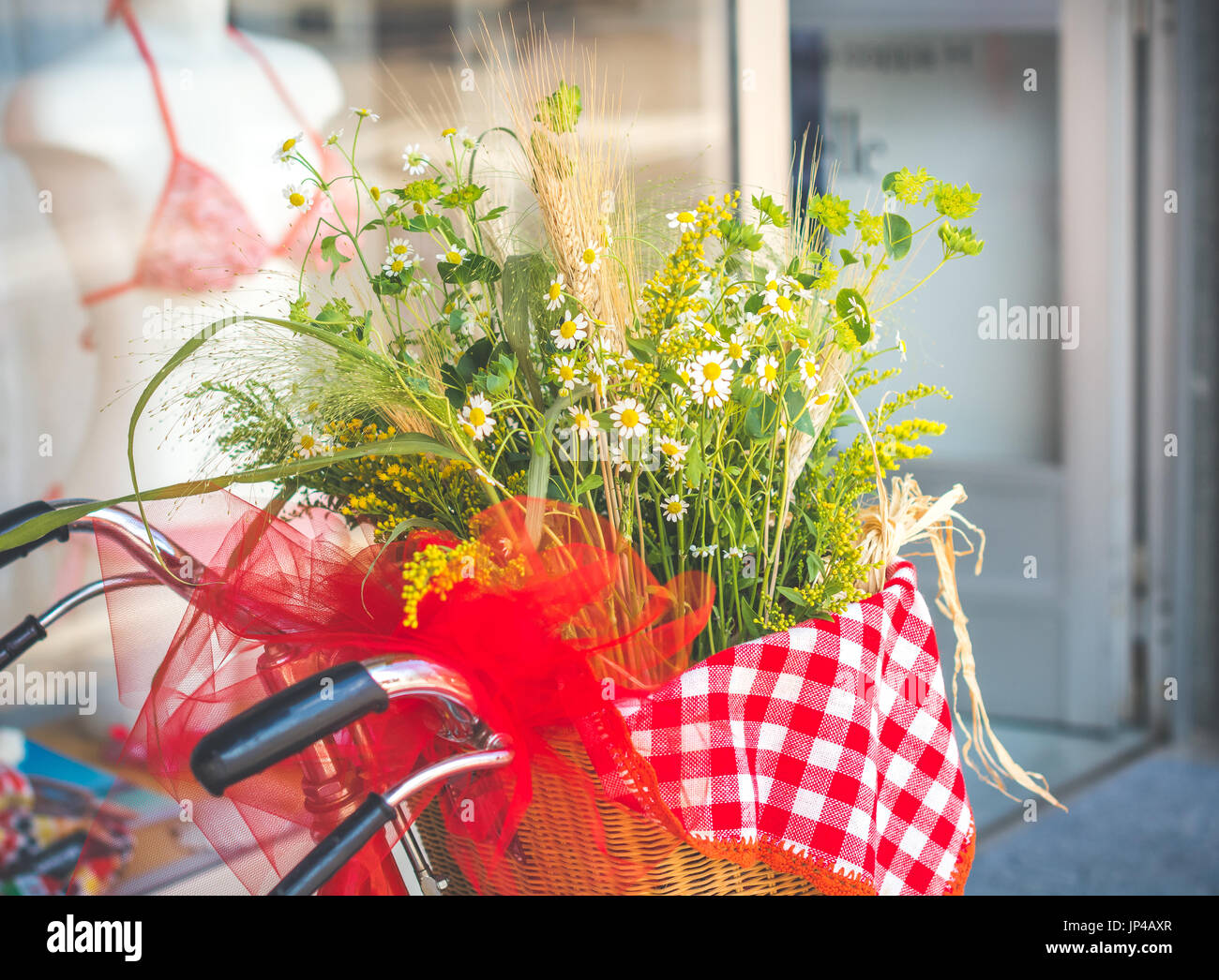 Spring flowers on the bicycle. Soft focus with vintage effect style ...