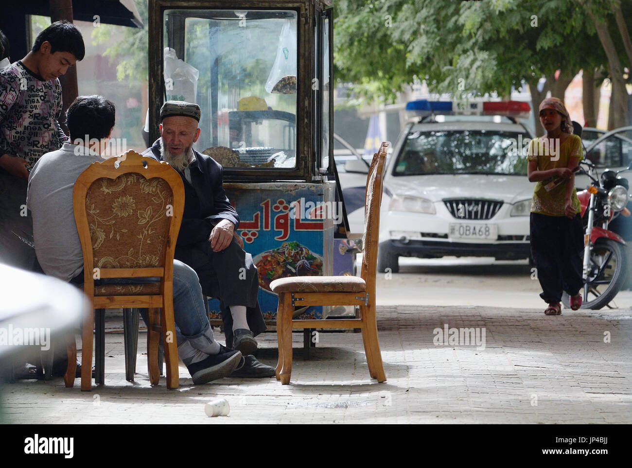 HOTAN, China - Local residents in Hotan's Guma, the Xinjiang Uygur ...