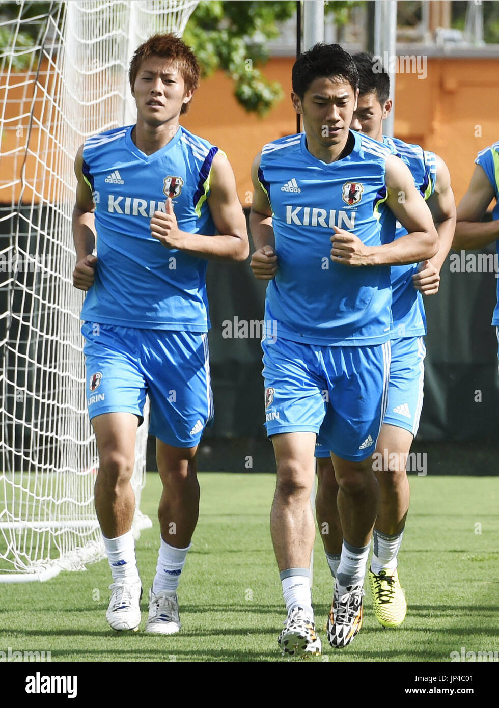 CLEARWATER, United States - Shinji Kawaga of Manchester United (R) jogs ...
