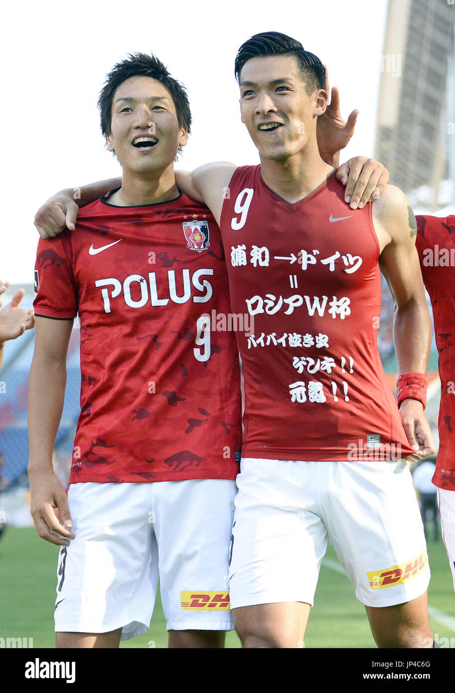 SAITAMA, Japan - Tomoaki Makino of Urawa Reds celebrates with Genki ...