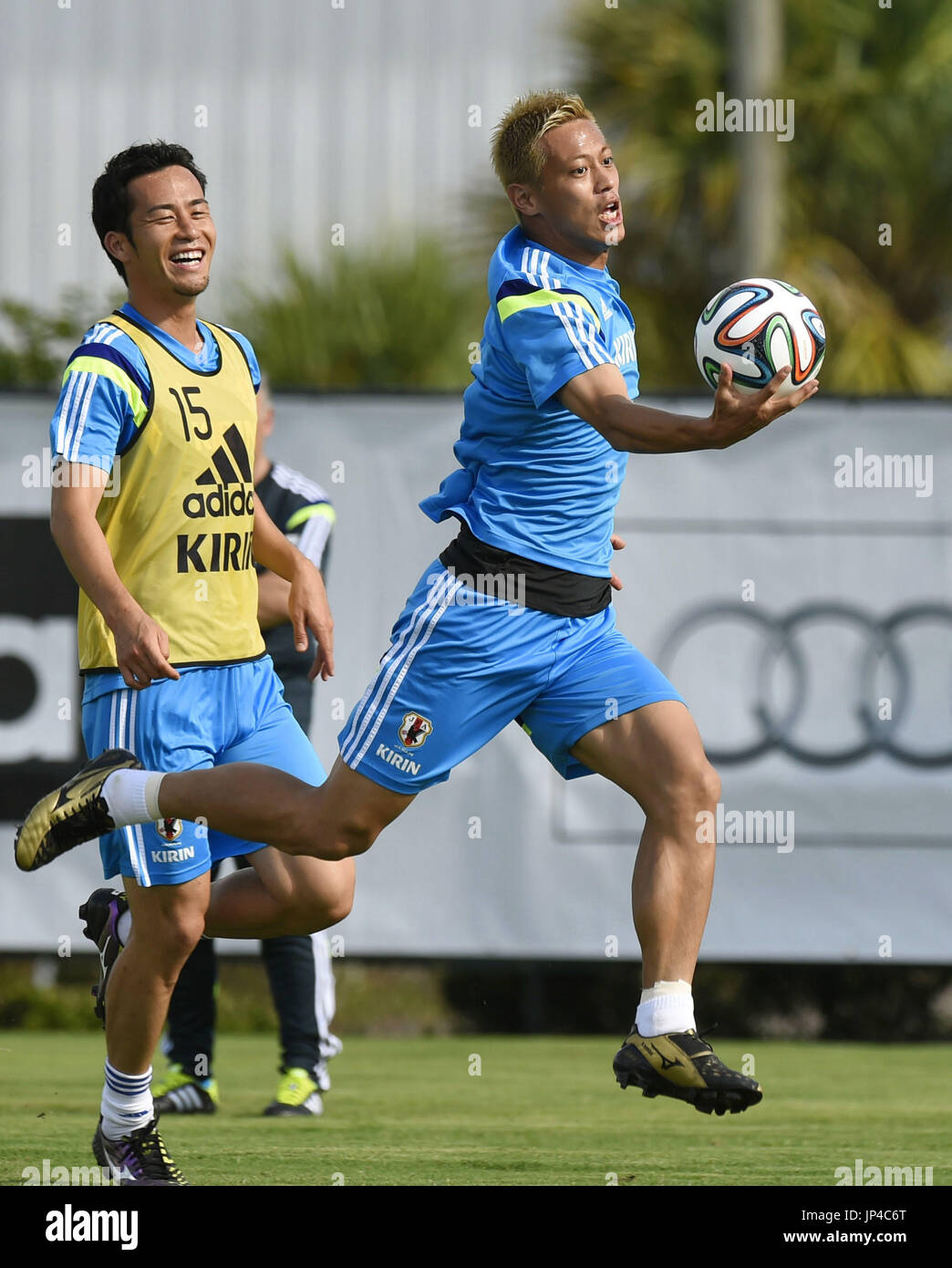 CLEARWATER, United States - Keisuke Honda (R) makes a pass in a ...