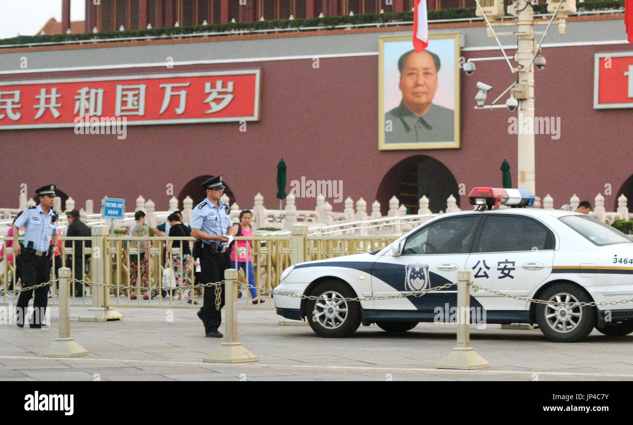 BEIJING, China - Police officers guard an area in front of Tiananmen ...