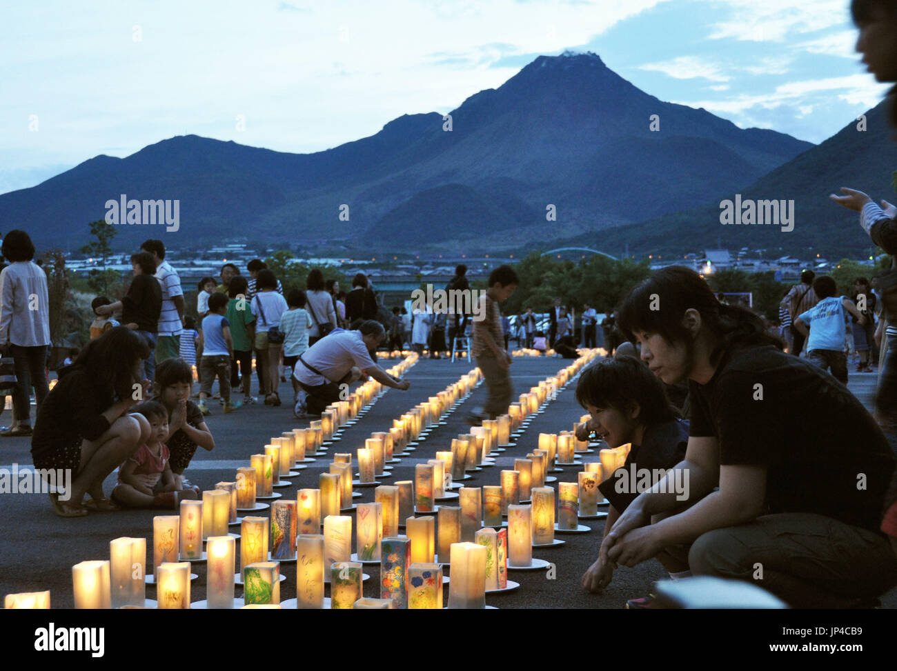 SHIMABARA, Japan - People light candles on June 3, 2014, at Mt. Unzen ...