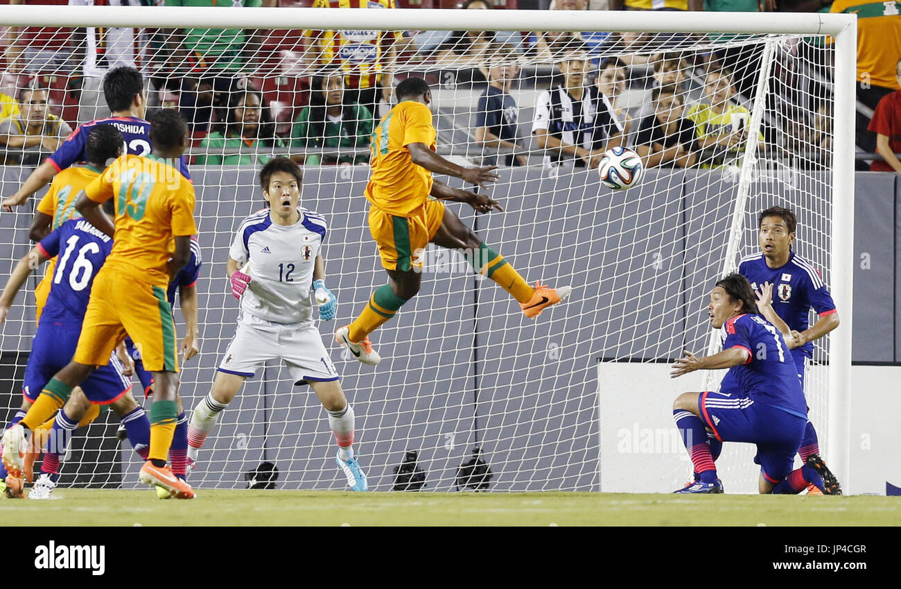 TAMPA, United States - Zambia's Lubambo Musonda heads home an equalizer ...