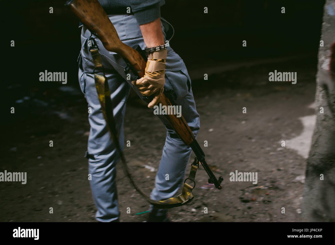 Holding assault rifle up hi-res stock photography and images - Alamy
