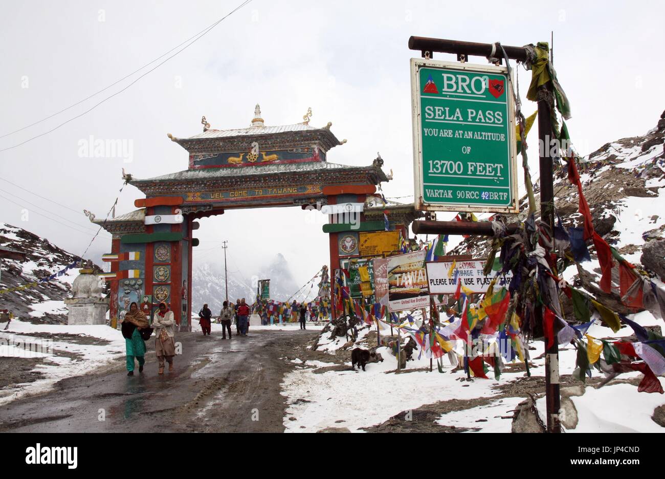 SELA PASS, India - People walk through the Sela Pass at an altitude of ...