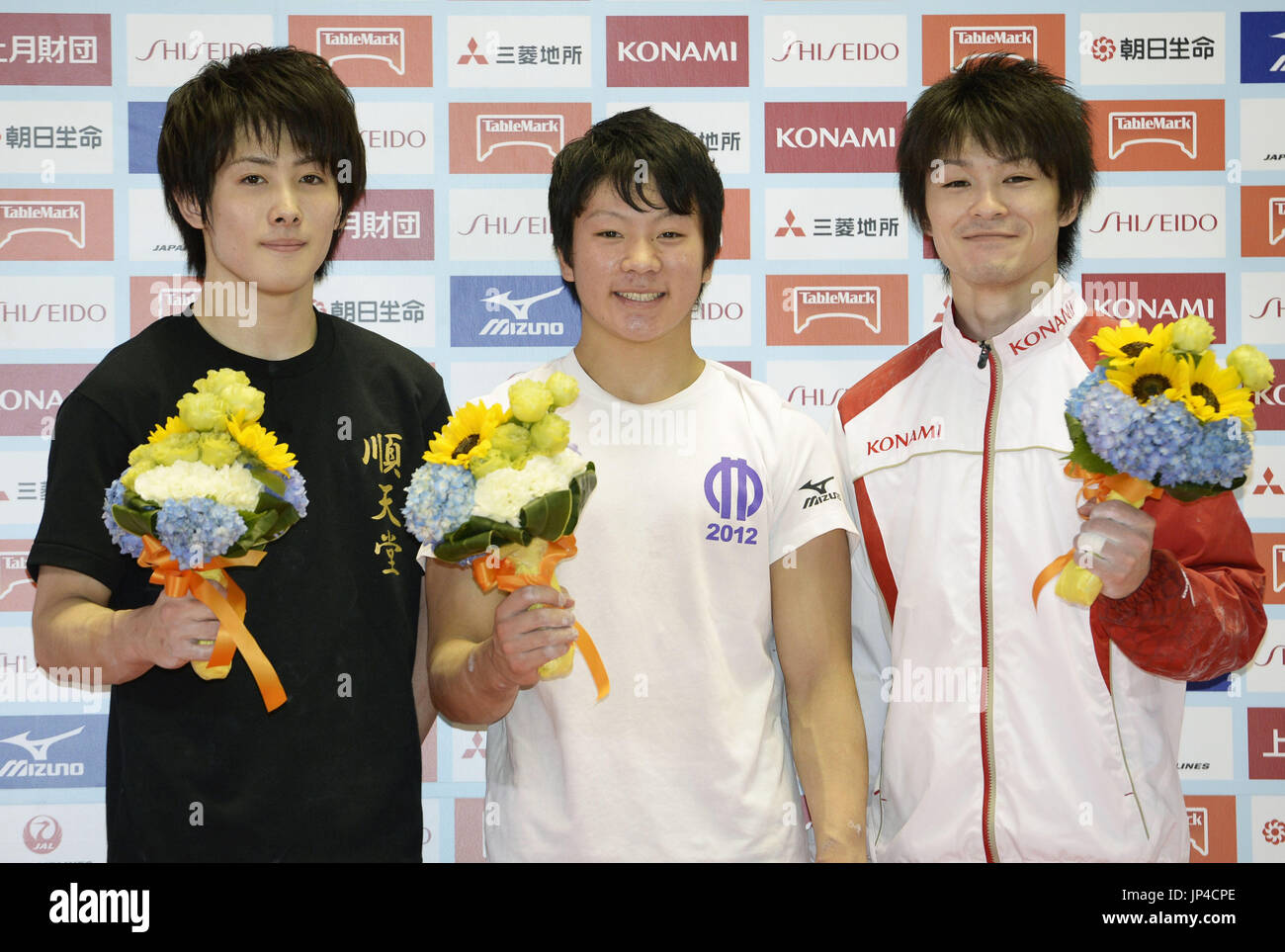 TOKYO, Japan - Japanese gymnasts -- (from L to R) Ryohei Kato, Shogo Nonomura and Kohei Uchimura ...