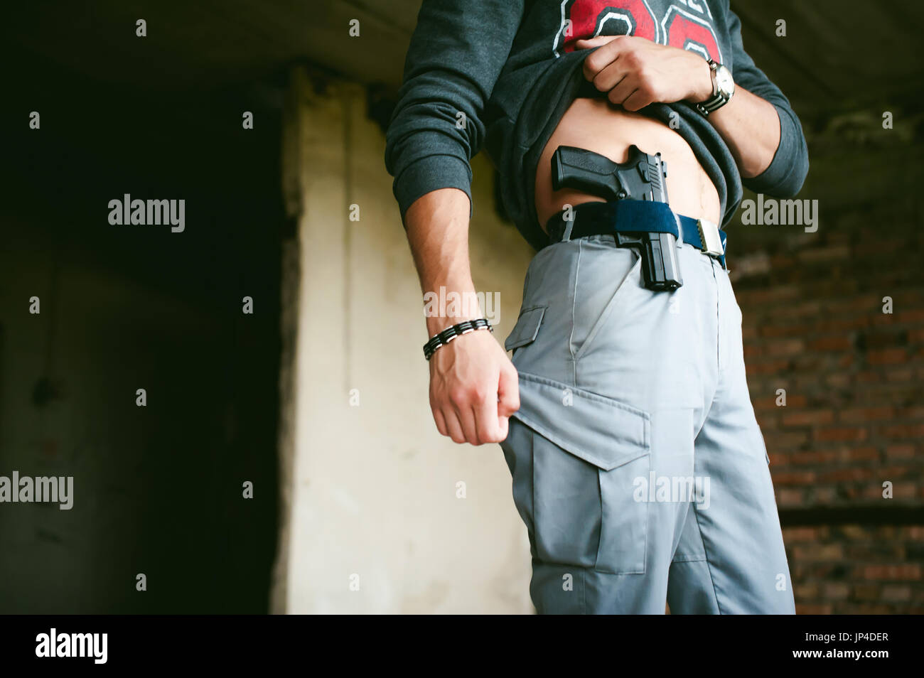 Hand holding bullets cartridge bullet hi-res stock photography and ...