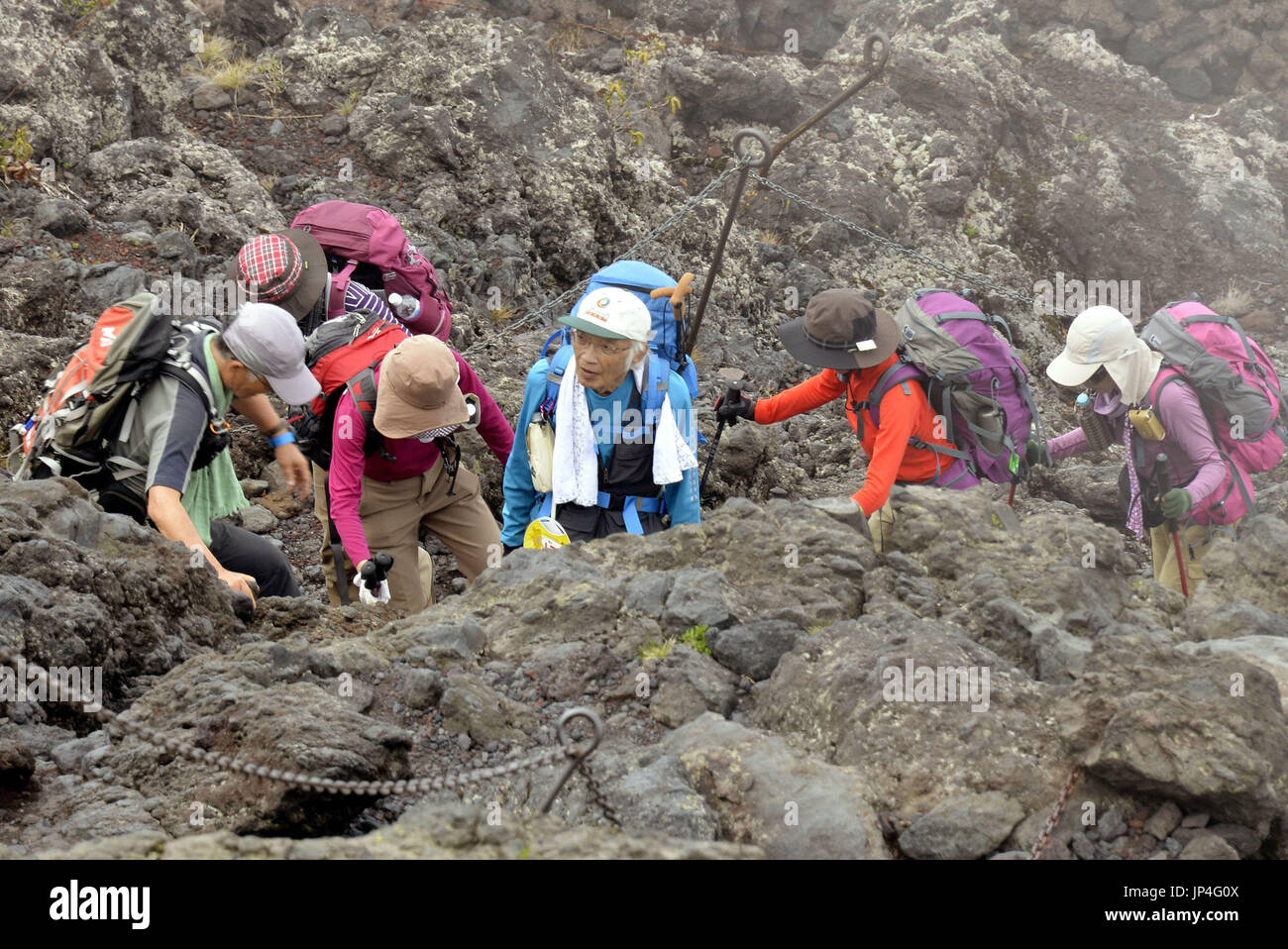 FUJIYOSHIDA, Japan - Climbers climb Mt. Fuji from the Yamanashi side on ...