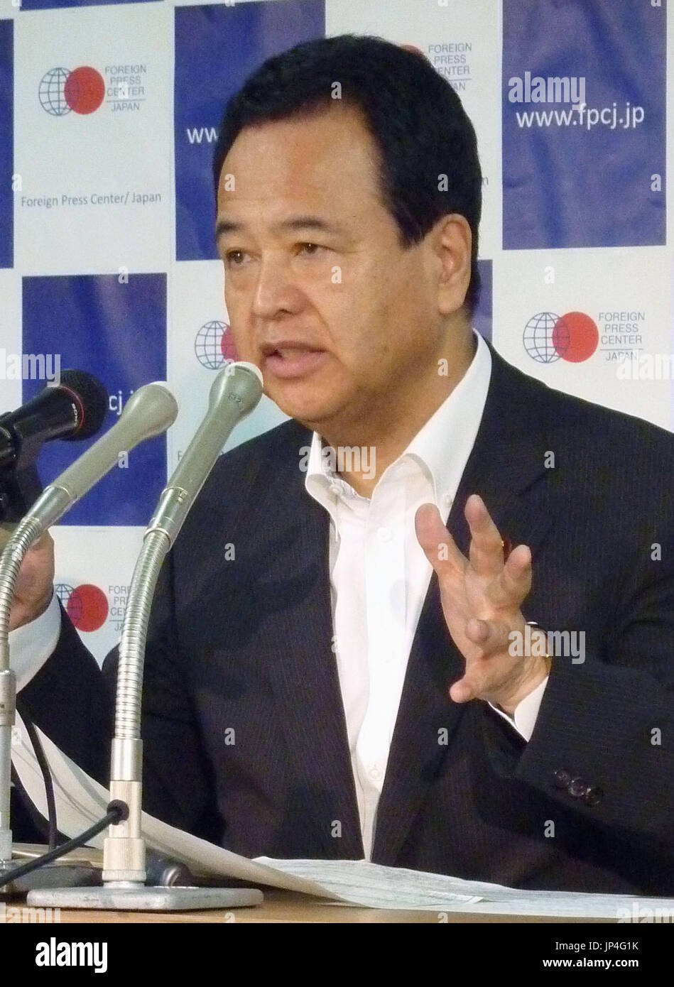 TOKYO, Japan - Economic and fiscal policy minister Akira Amari attends ...