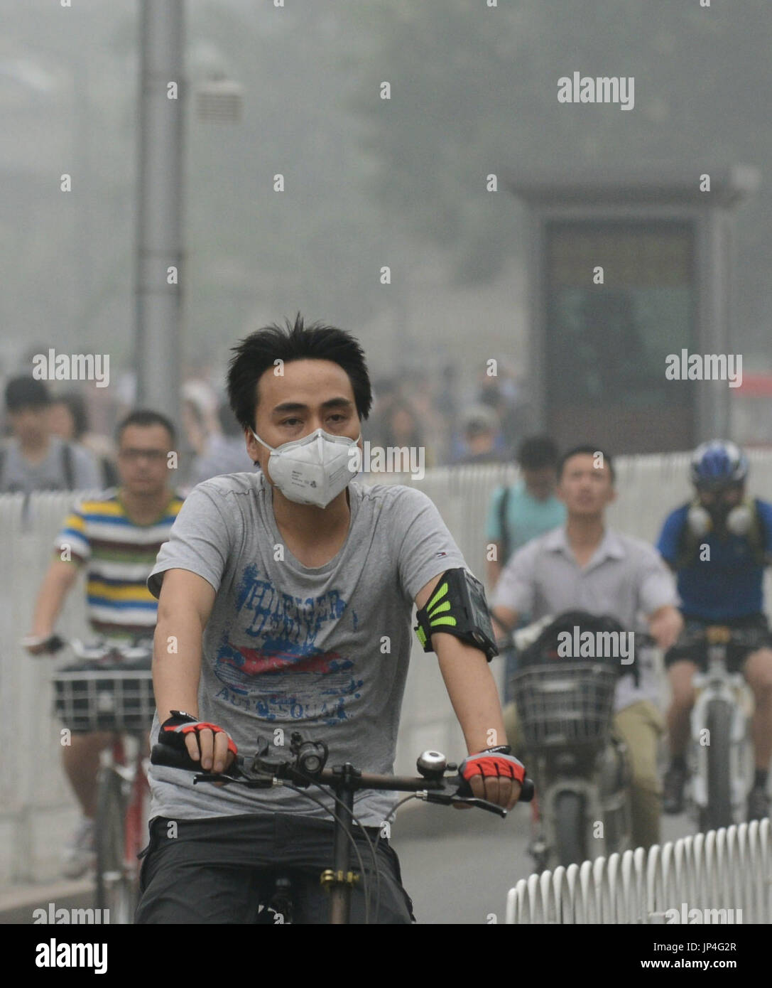 BEIJING, China - A man wears mask due to severe air pollution in ...
