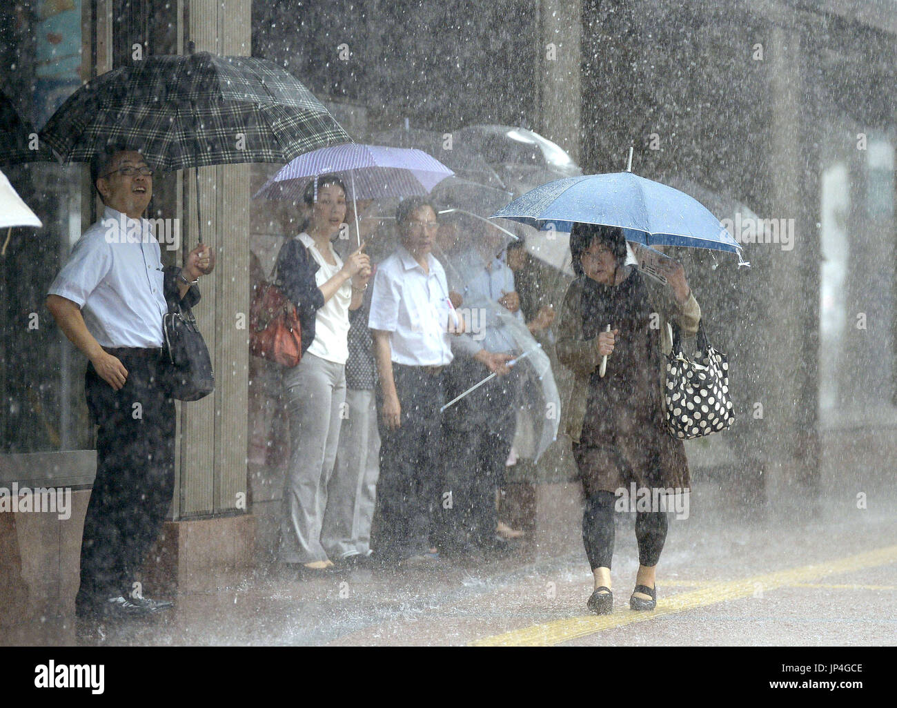 FUKUOKA, Japan - Photo shows heavy rainfall in Fukuoka's Tenjin ...