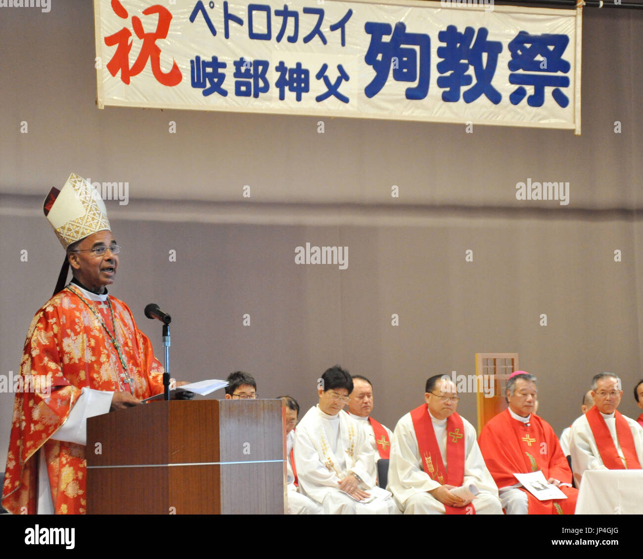 KUNISAKI, Japan - Archbishop Joseph Chennoth (extreme L), the Vatican's ...