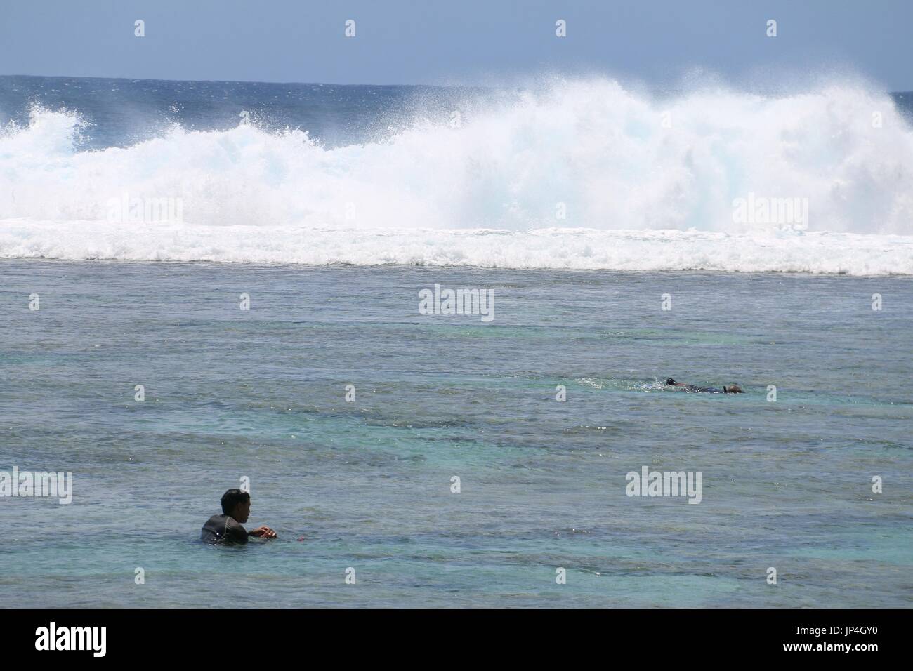 SAIPAN, United States - A diver from the Saipan police searches at sea ...