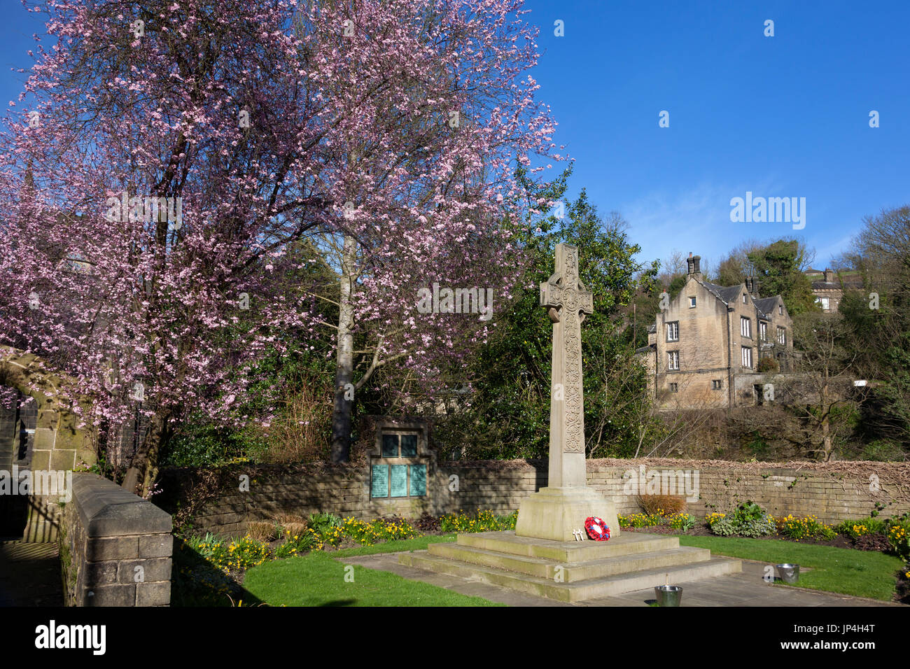 War memorial with Spring blossom, Luddenden, West Yorkshire Stock Photo ...