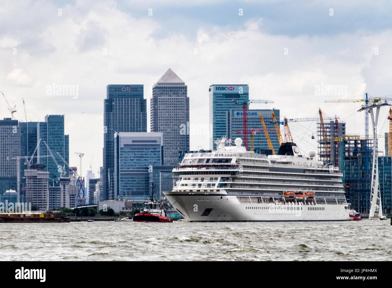 UK,London,MV Viking Sea cruise ship passes Canary Wharf banking and ...