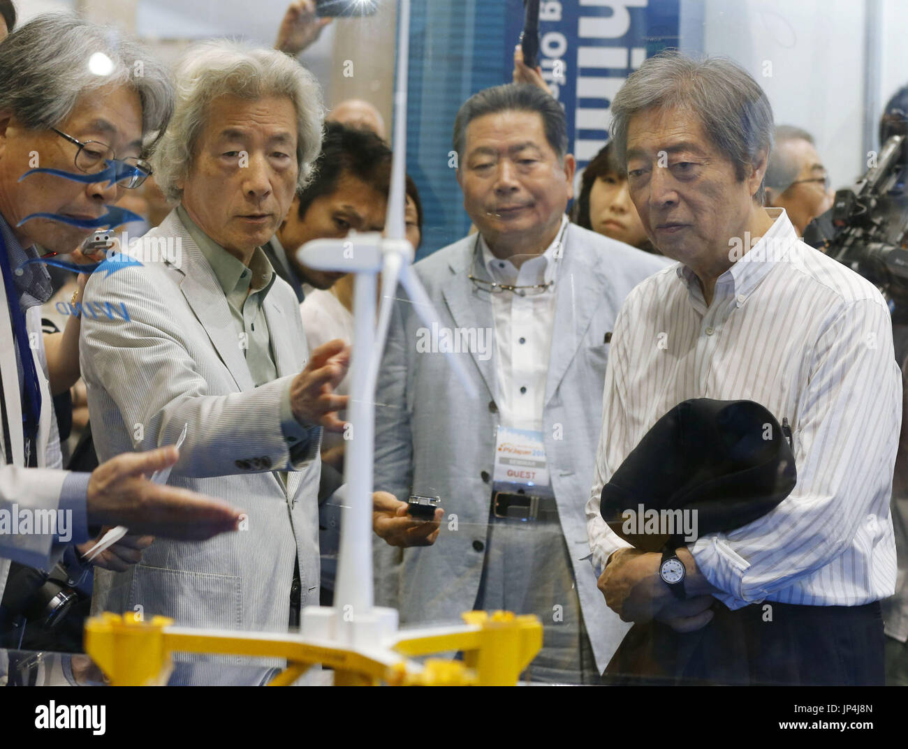 TOKYO, Japan - Former Japanese prime ministers Junichiro Koizumi (2nd from L) and Morihiro ...