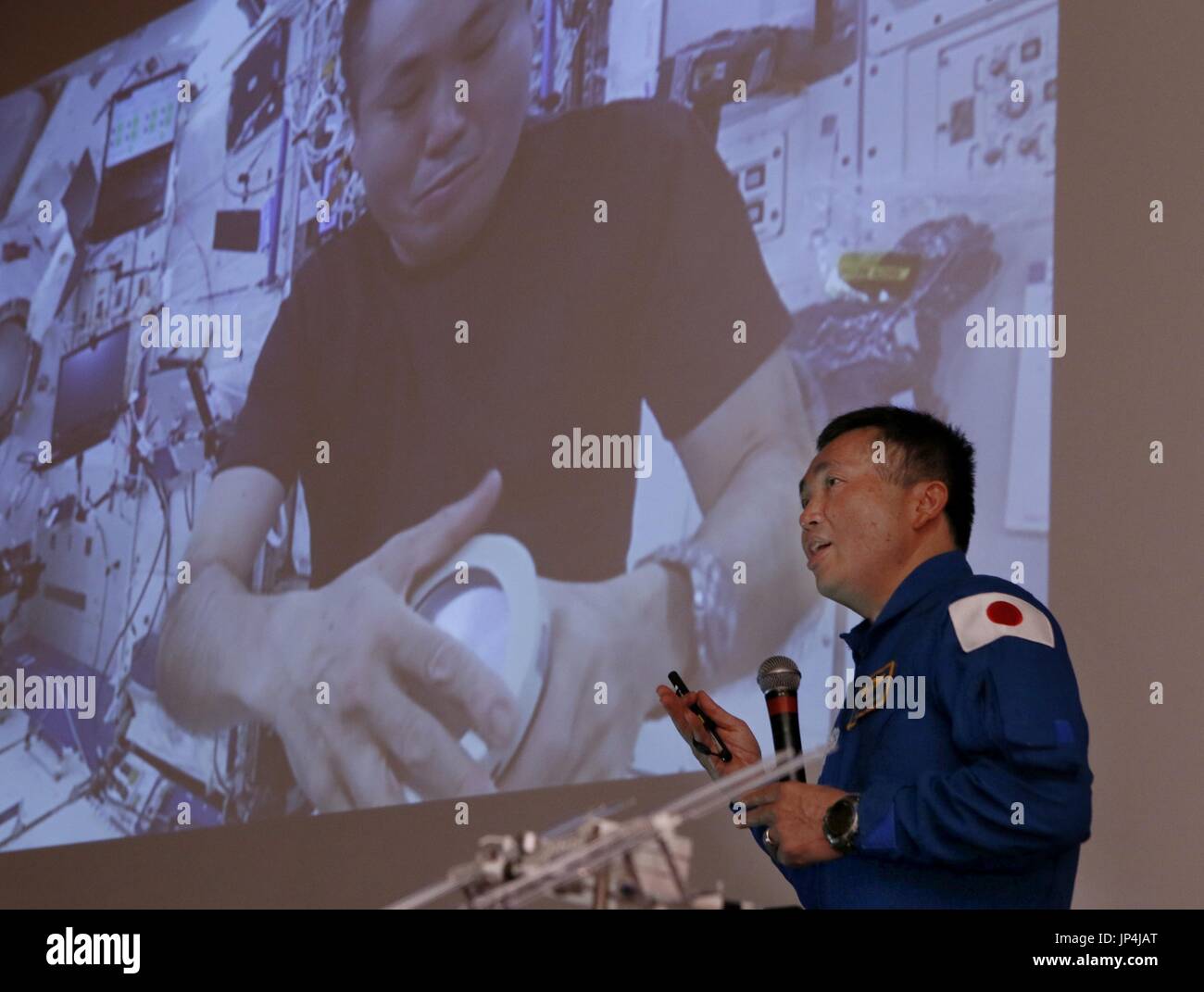 TOKYO, Japan - Astronaut Koichi Wakata explains his work as the first ...