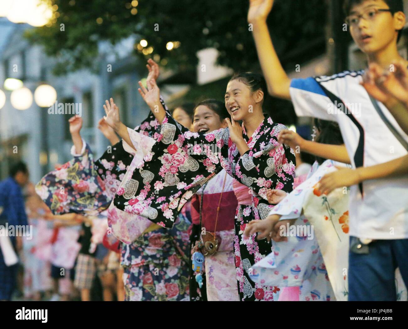 TOKYO, Japan - Photo taken July 14, 2014 shows local children dancing ...
