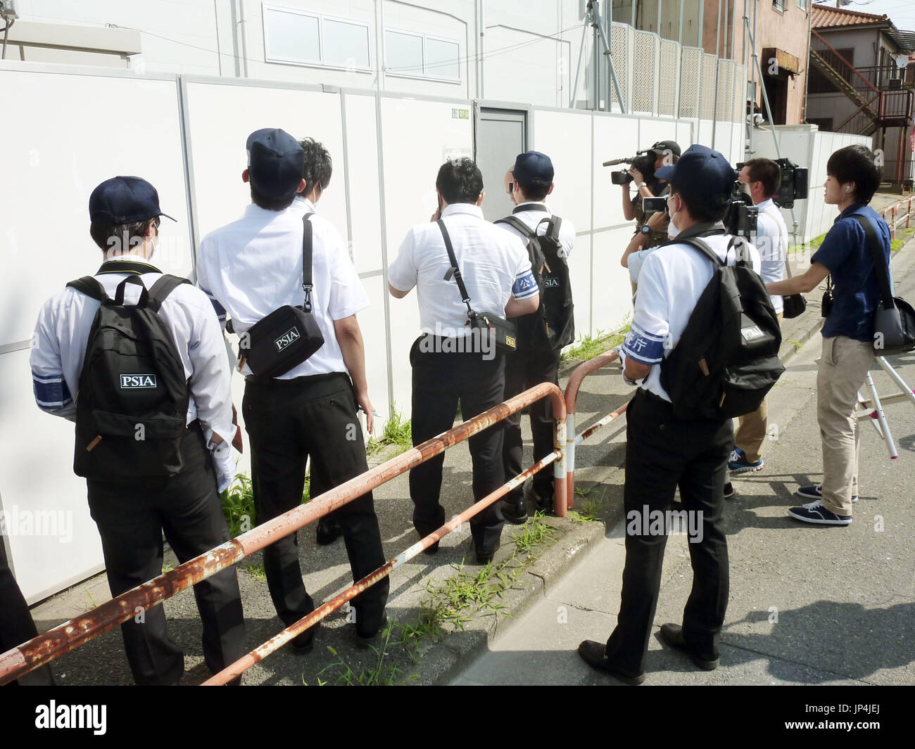 TOKYO, Japan - Officials from the Justice Ministry's Public Security ...