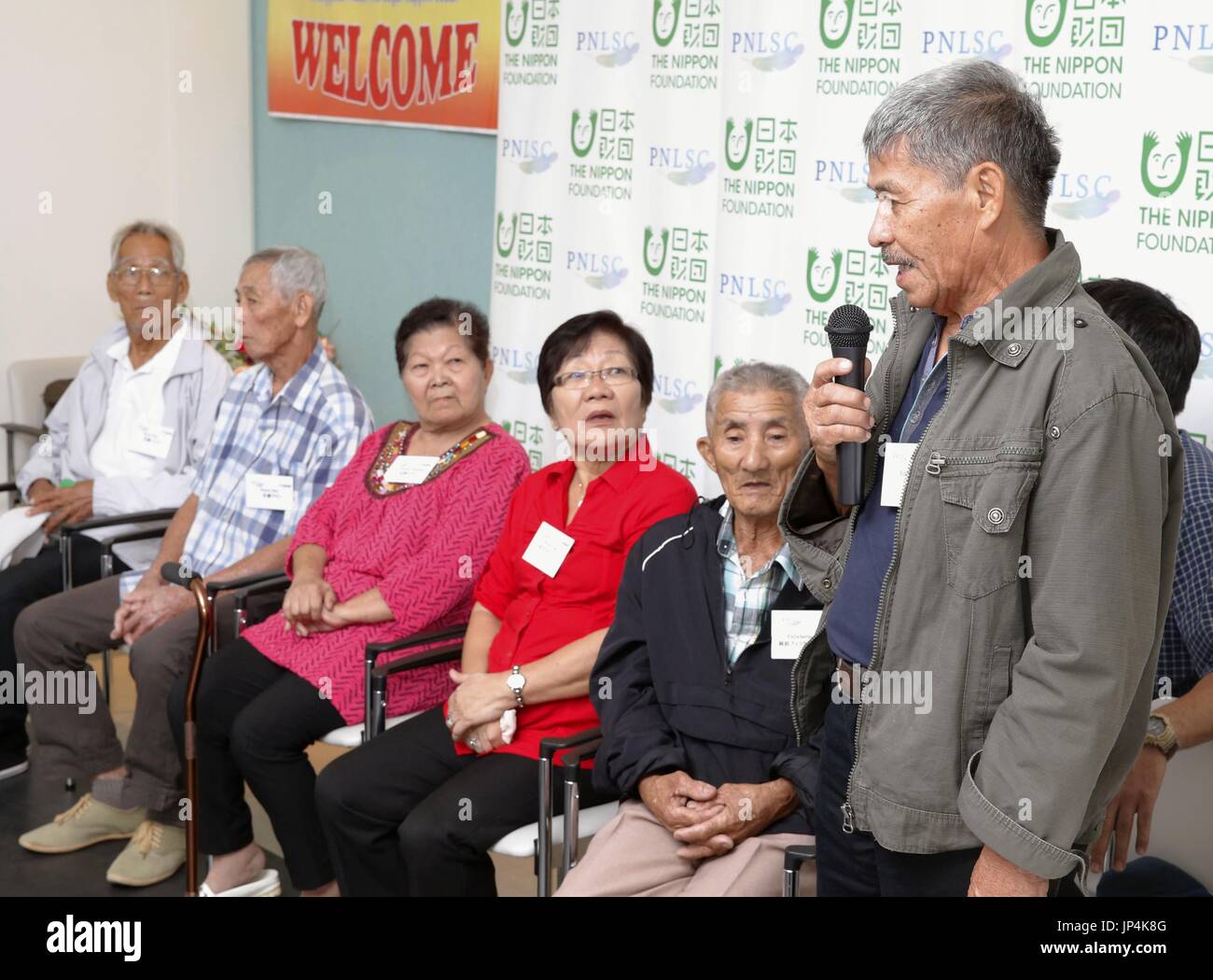 TOKYO, Japan - Hideo Miyake (R), who was born in the Philippines to a ...