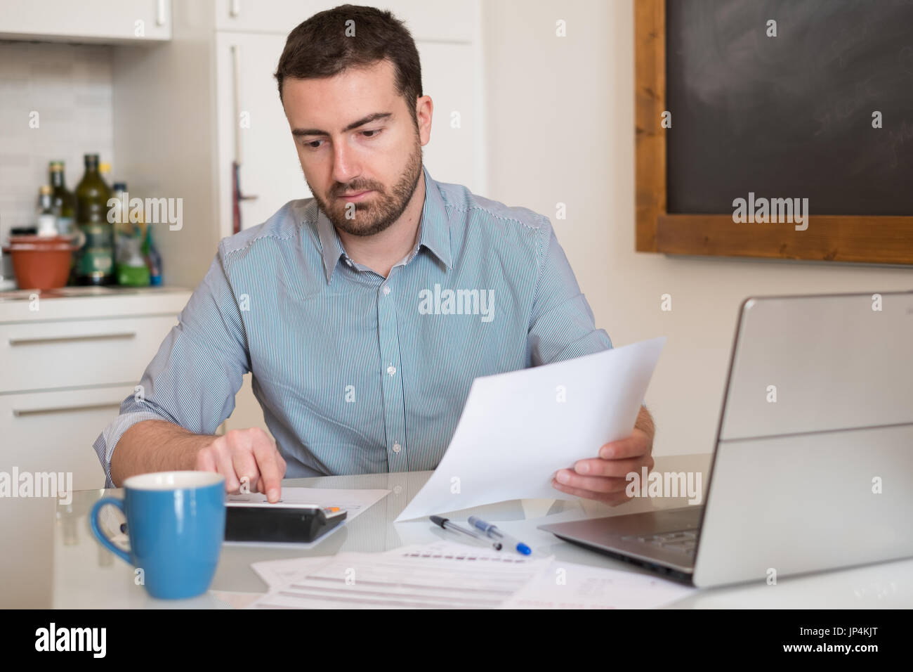 Calculating man hi-res stock photography and images - Alamy