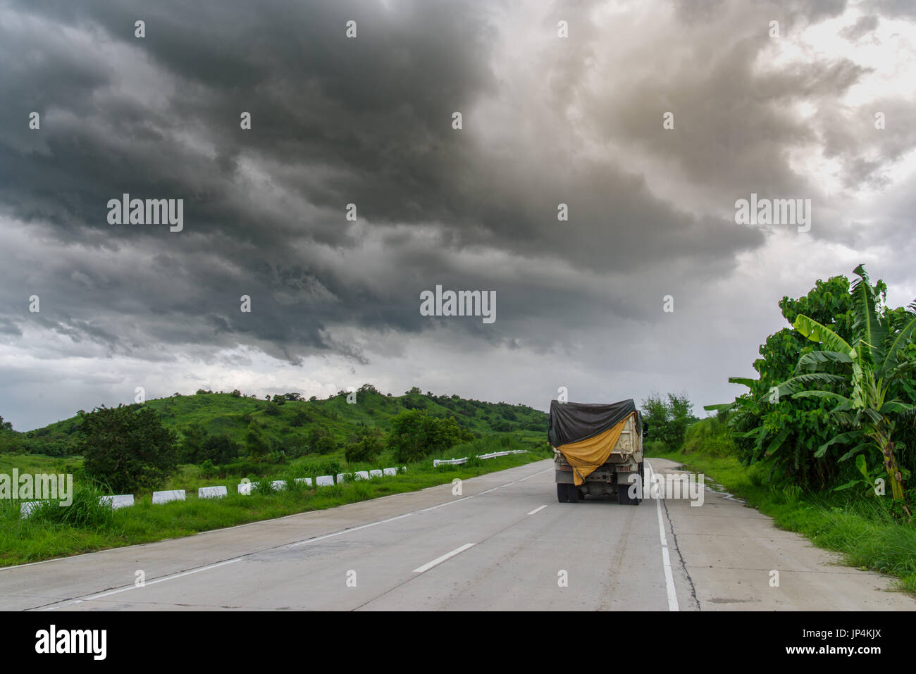 cloudy countryside road in the Philippines Stock Photo - Alamy