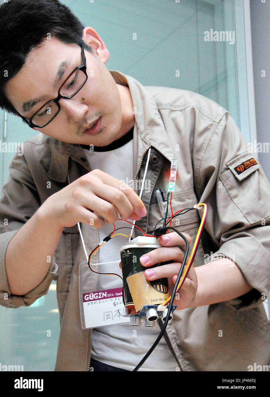 OSAKA, Japan - A participant in a "hackathon" held by Osaka Innovation ...