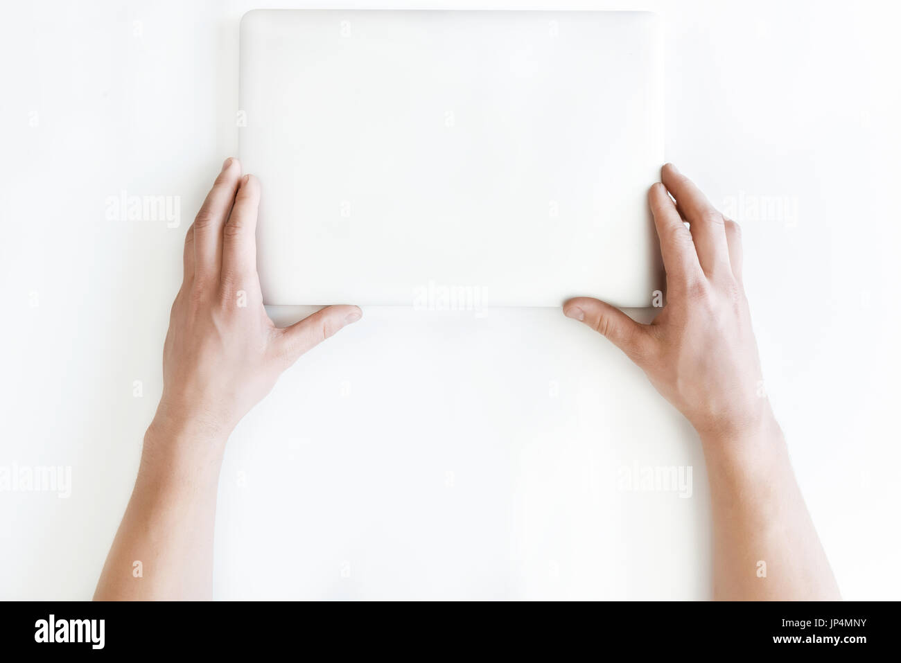 top view of human hands and laptop computer isolated on white, wireless ...