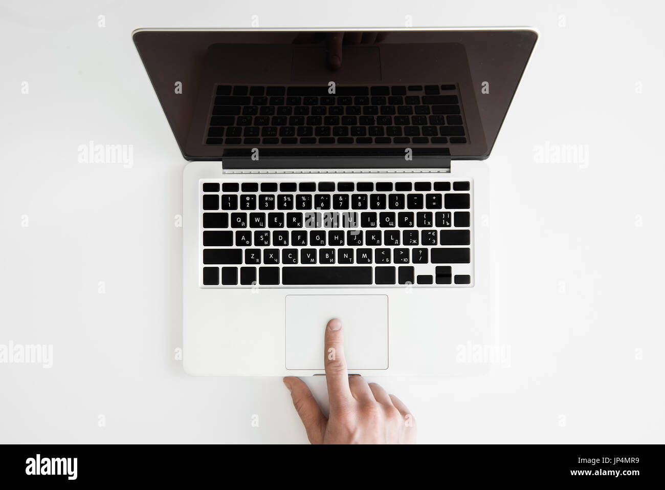 top view of human hand and laptop computer isolated on white, wireless ...