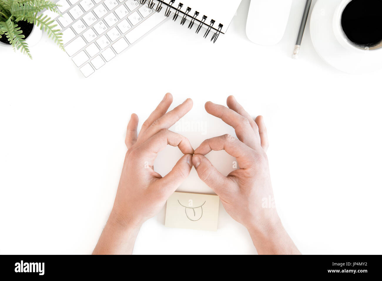 top view of human hands showing ok signs at workplace with computer ...