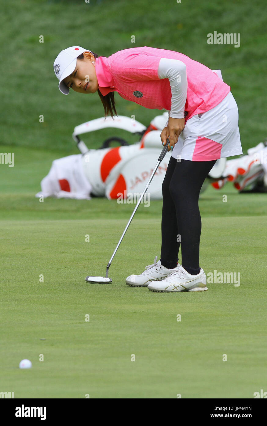 OWINGS MILLS, United States - Japanese golfer Sakura Yokomine follows ...