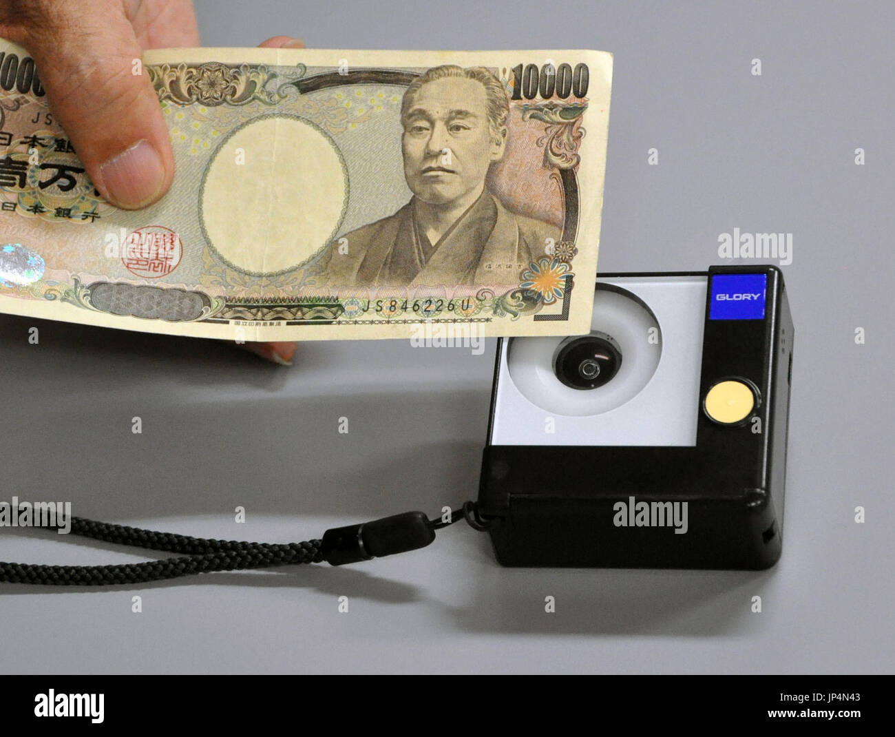 OSAKA, Japan - Glory Ltd. introduces a banknote-checking machine for ...