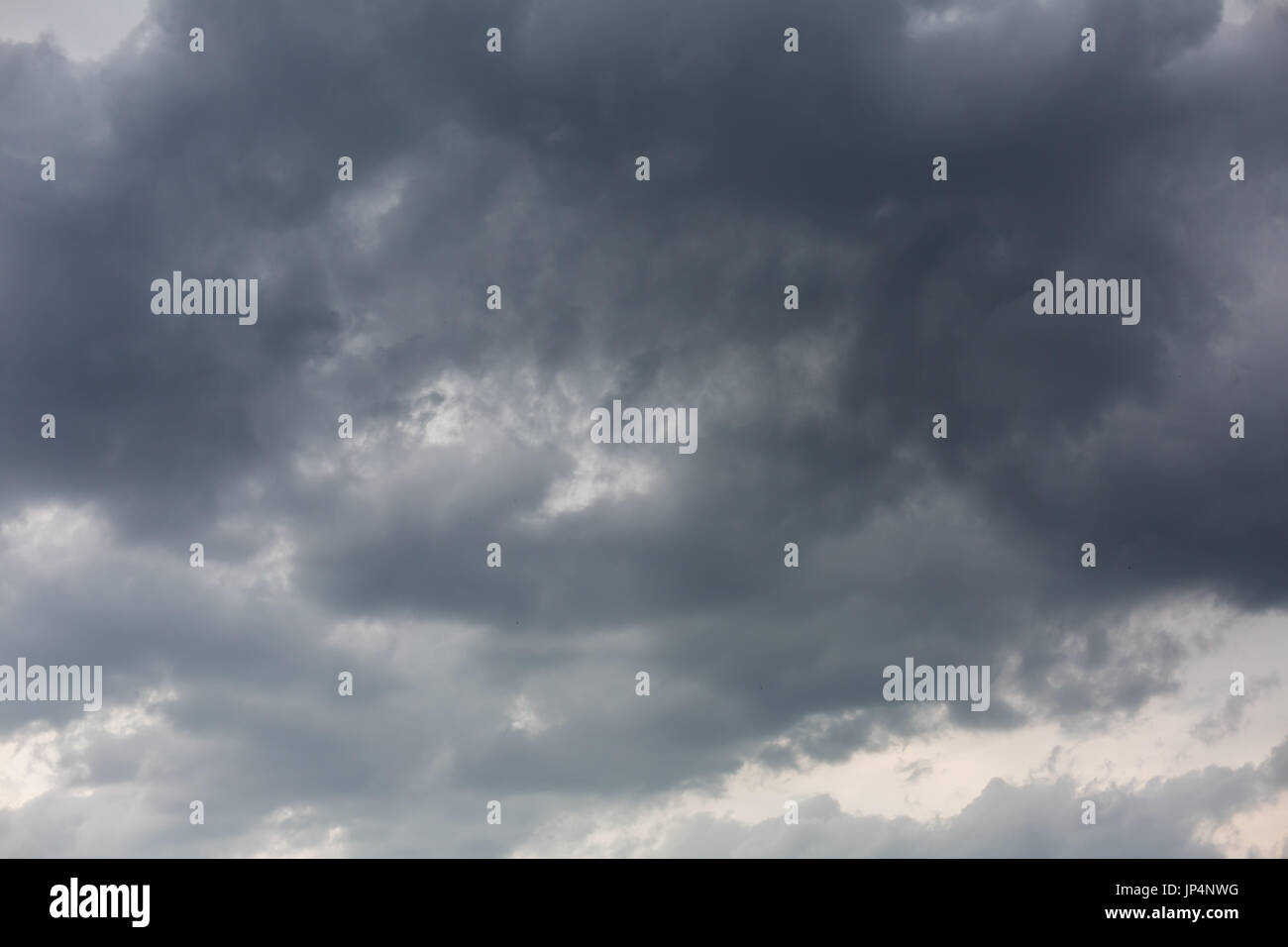 Beautiful dark clouds slowly flying in the sky. Stormy sky Stock Photo ...
