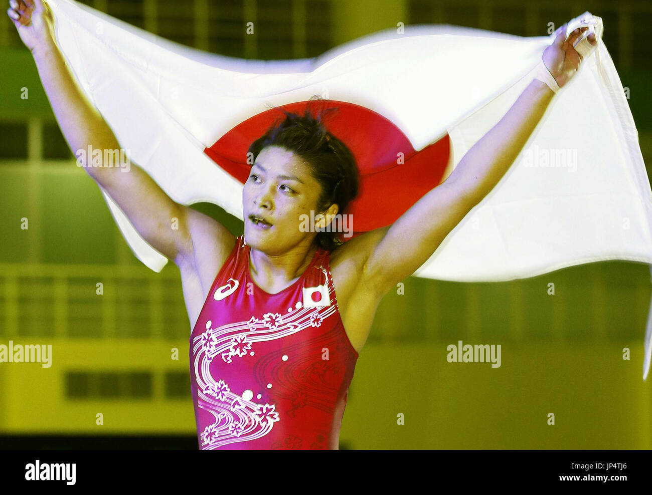 TASKENT, Uzbekistan - Japan's Kaori Icho holds the Japanese flag after ...