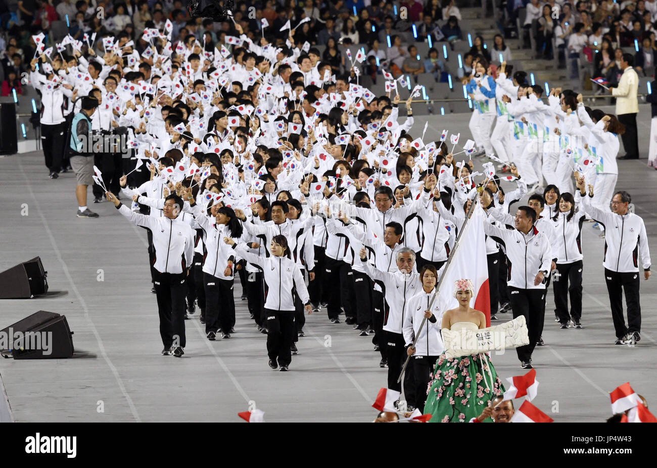 INCHEON, South Korea - Japanese athletes take part in the entrance ...